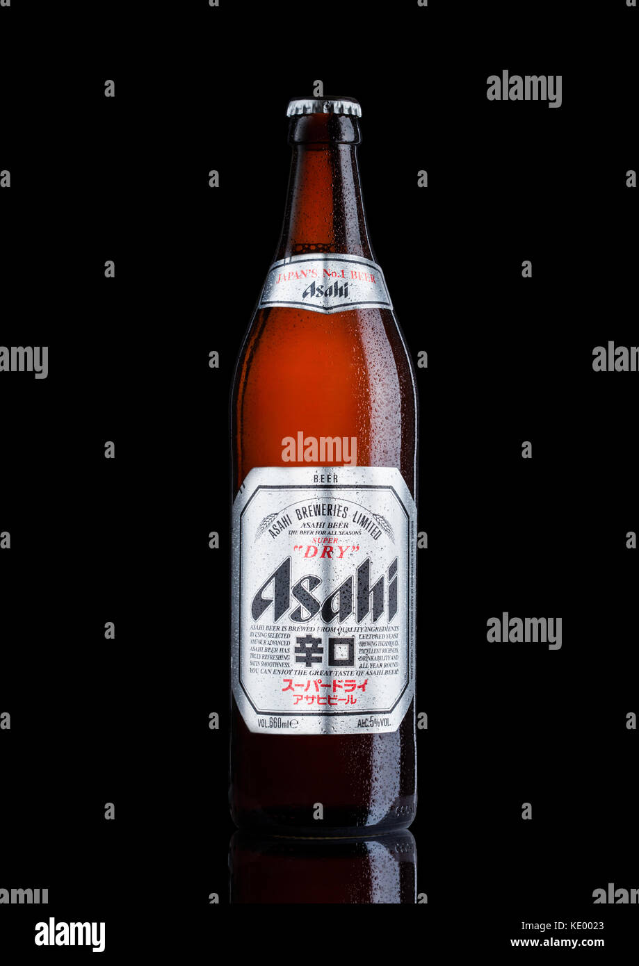 LONDON, UK - MARCH 15, 2017: Bottle of Asahi Lager beer on black ...