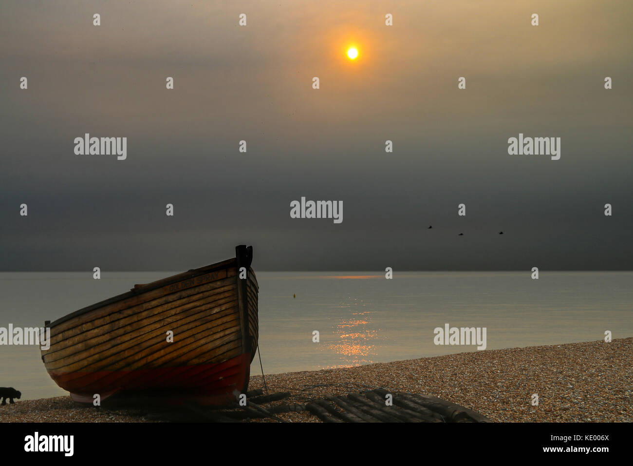 Golden Spray - Saharan Dust sky Stock Photo - Alamy