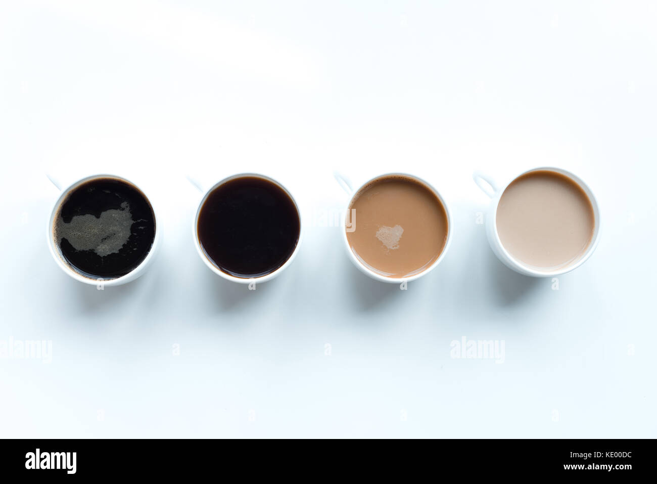 close-up view of different kinds of coffee in row isolated on white ...