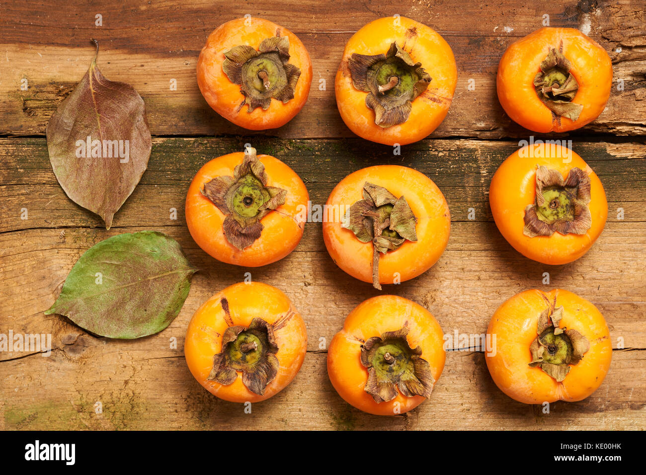 Organic persimmons hi-res stock photography and images - Alamy