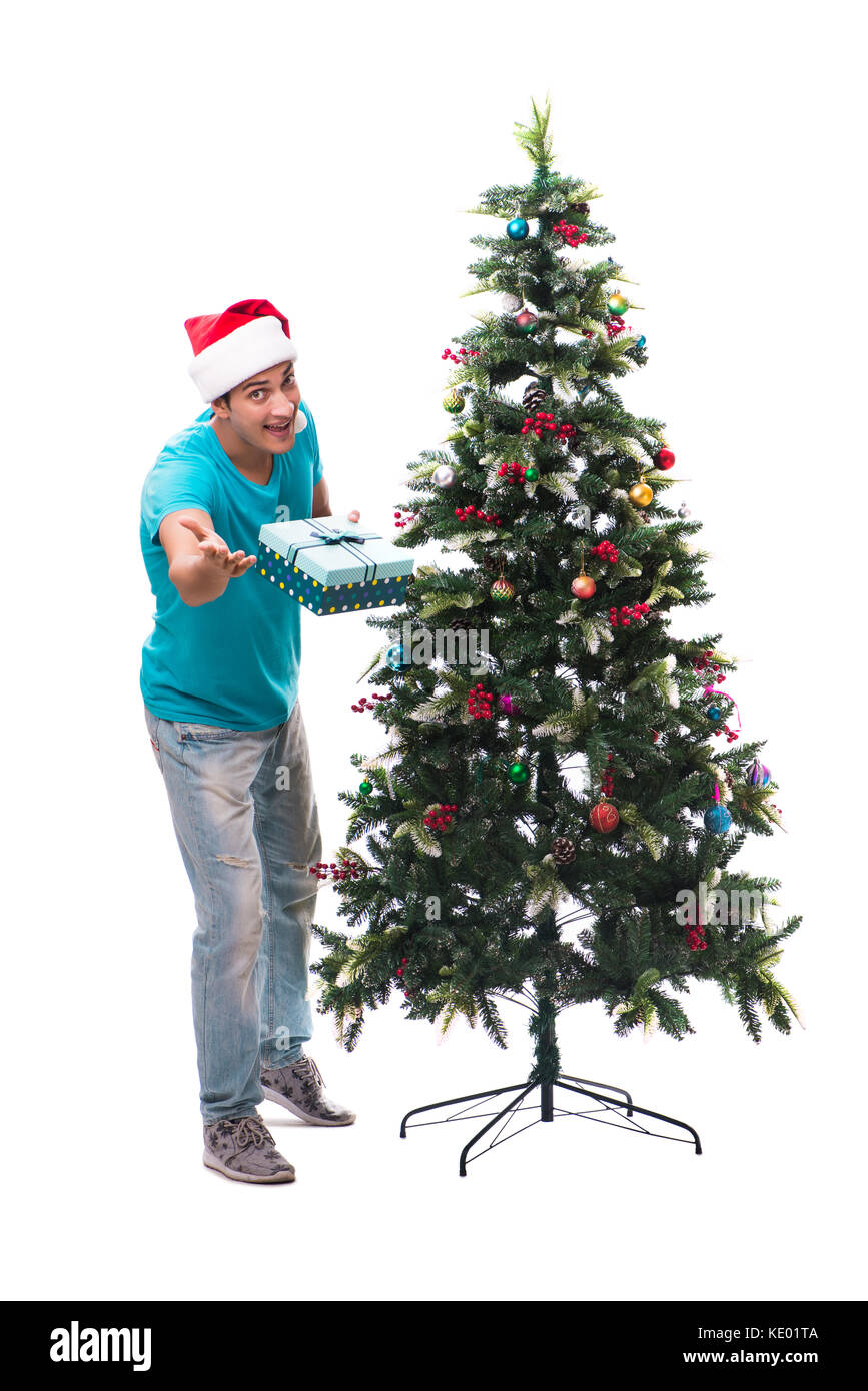 Young man decorating christmas tree isolated on white Stock Photo - Alamy