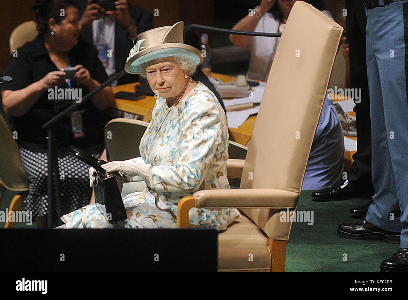 NEW YORK - JULY 06: Queen Elizabeth II signs the visitors book as she ...