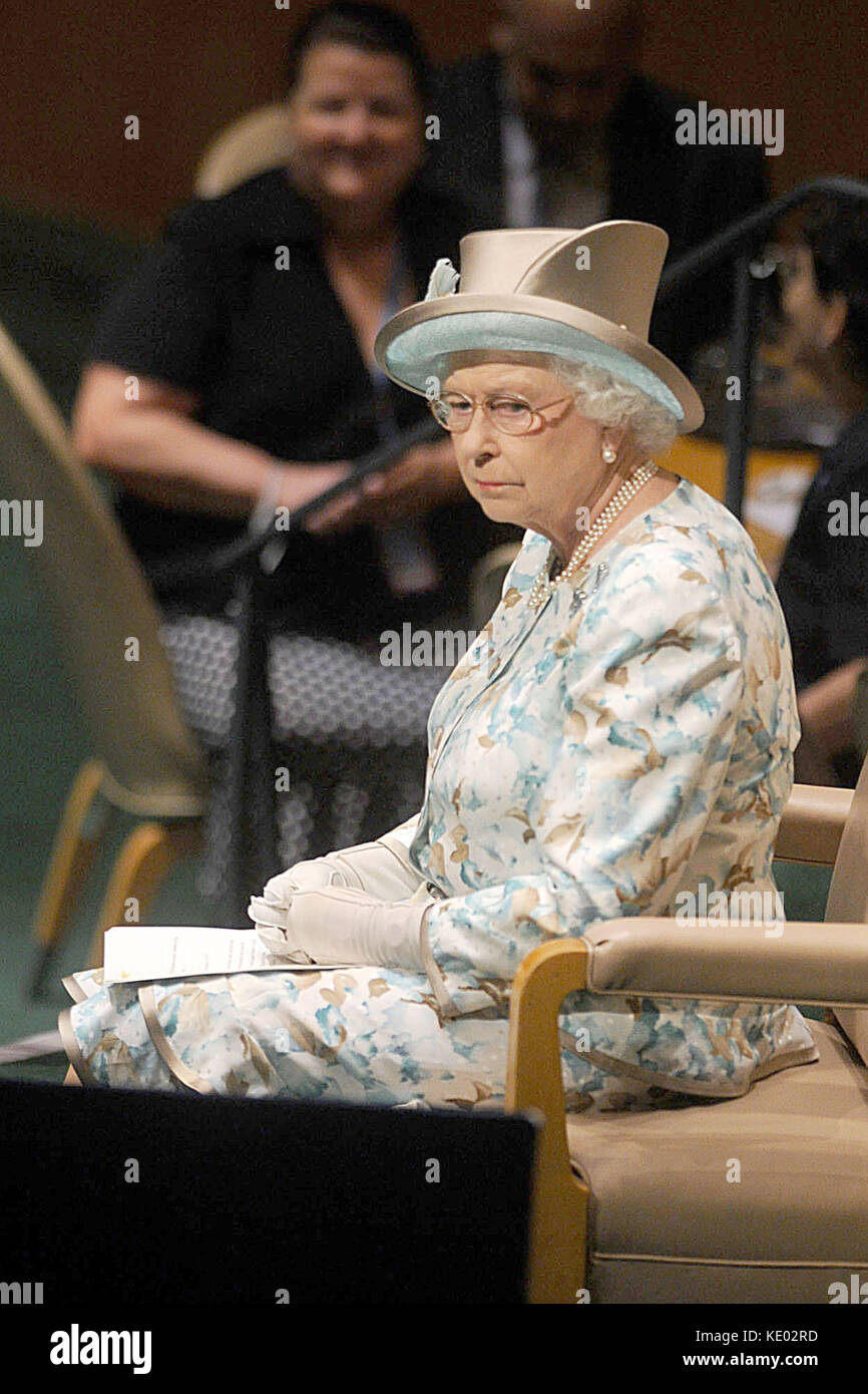 NEW YORK - JULY 06: Queen Elizabeth II signs the visitors book as she ...