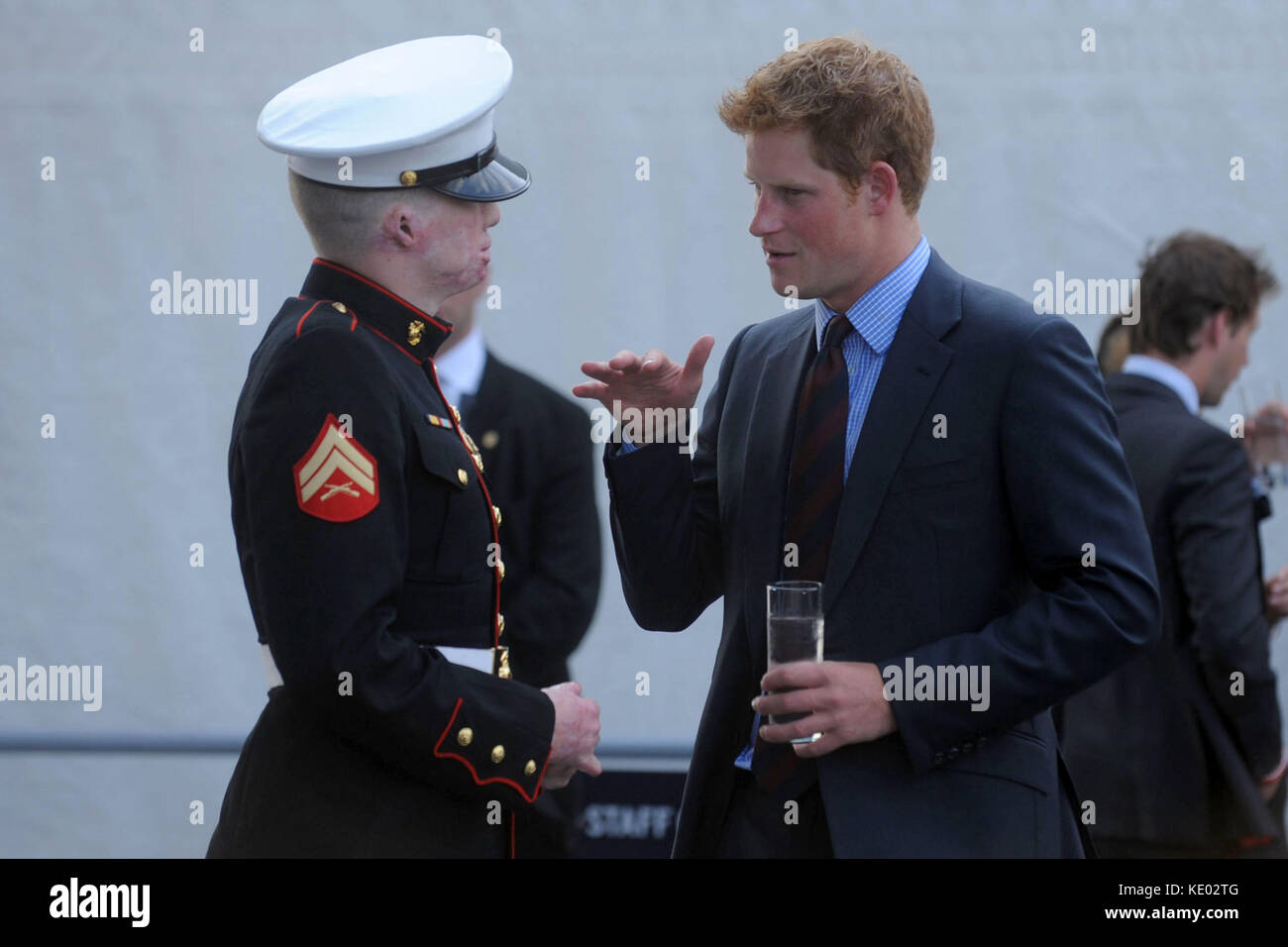 NEW YORK - JUNE 25: Prince Harry (R) speaks with U.S. Marine veteran ...