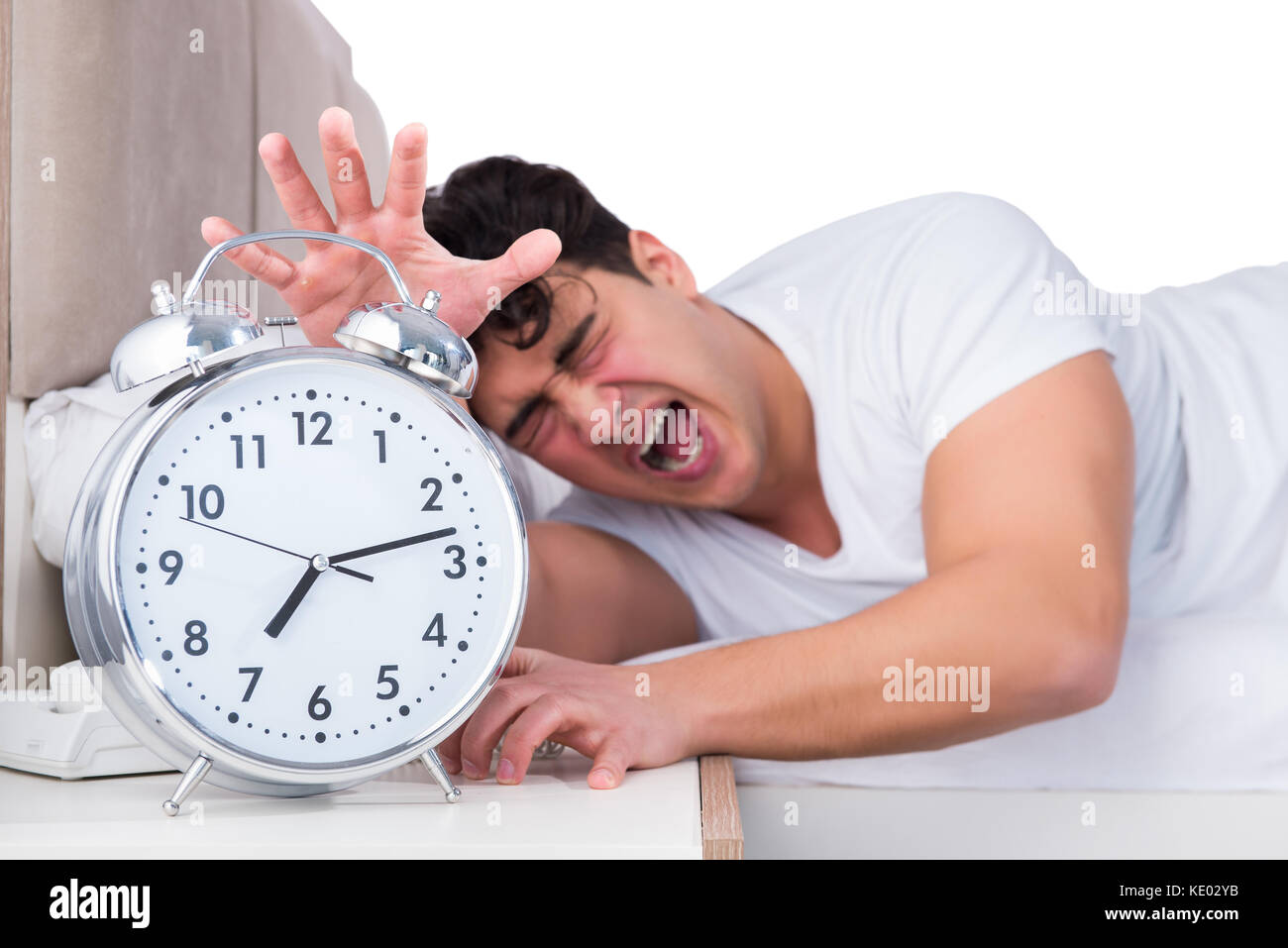 Man in bed suffering from insomnia Stock Photo - Alamy
