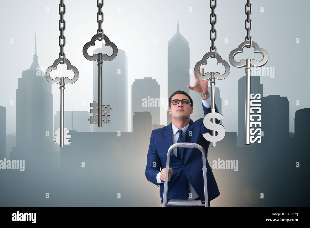 Businessman in key to financial success concept Stock Photo - Alamy