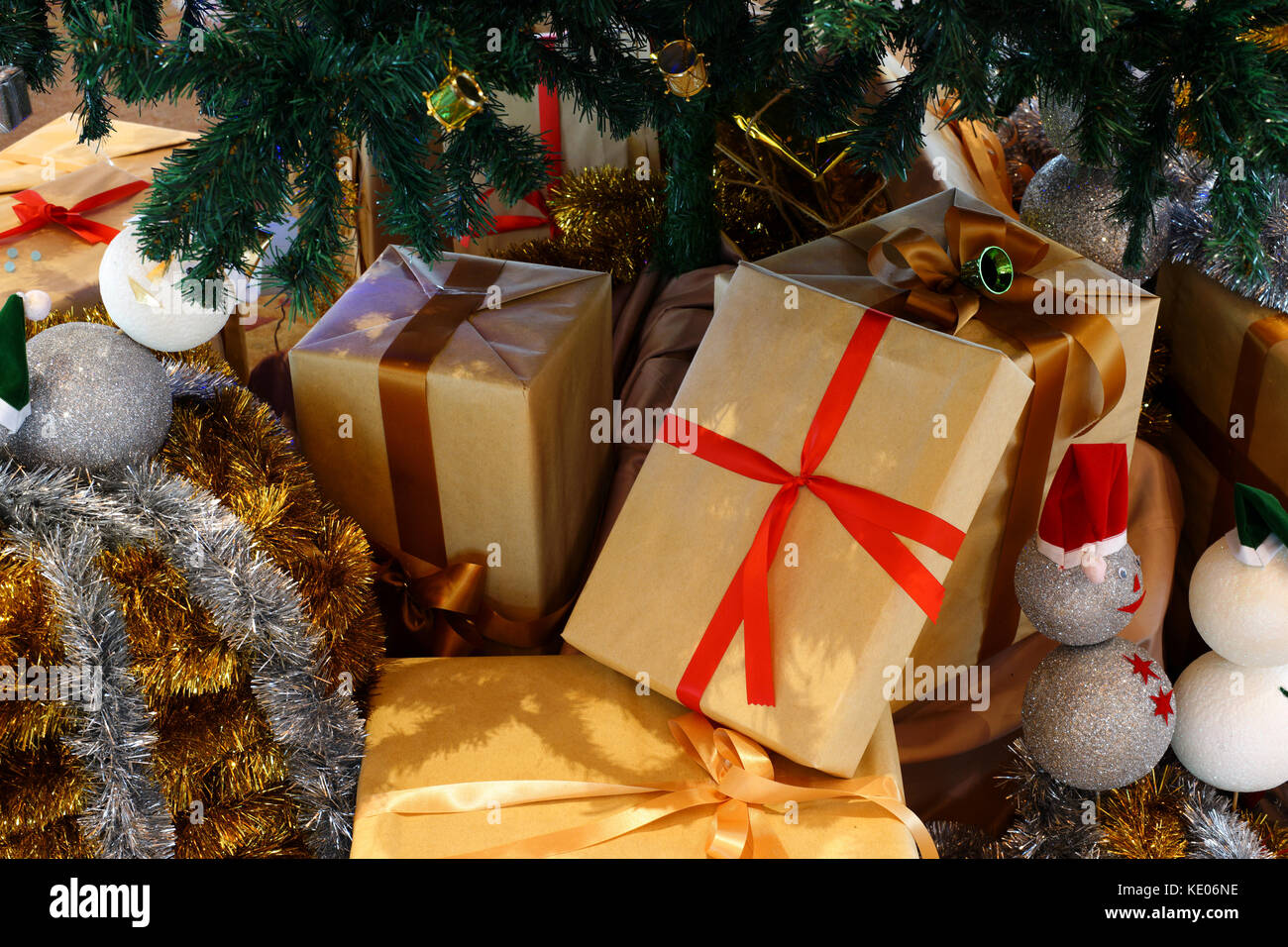 pile of gift boxes under the christmas tree Stock Photo - Alamy