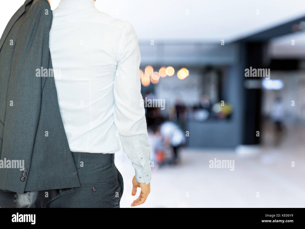 isolated business man on shopping mall background Stock Photo - Alamy