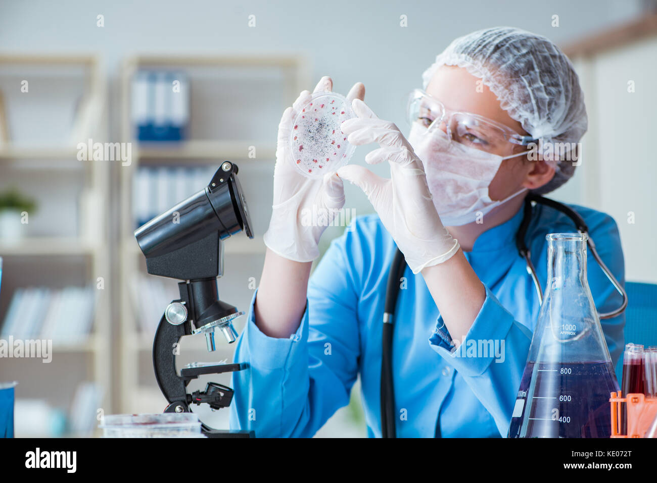 Female scientist researcher doing experiments in laboratory Stock Photo ...