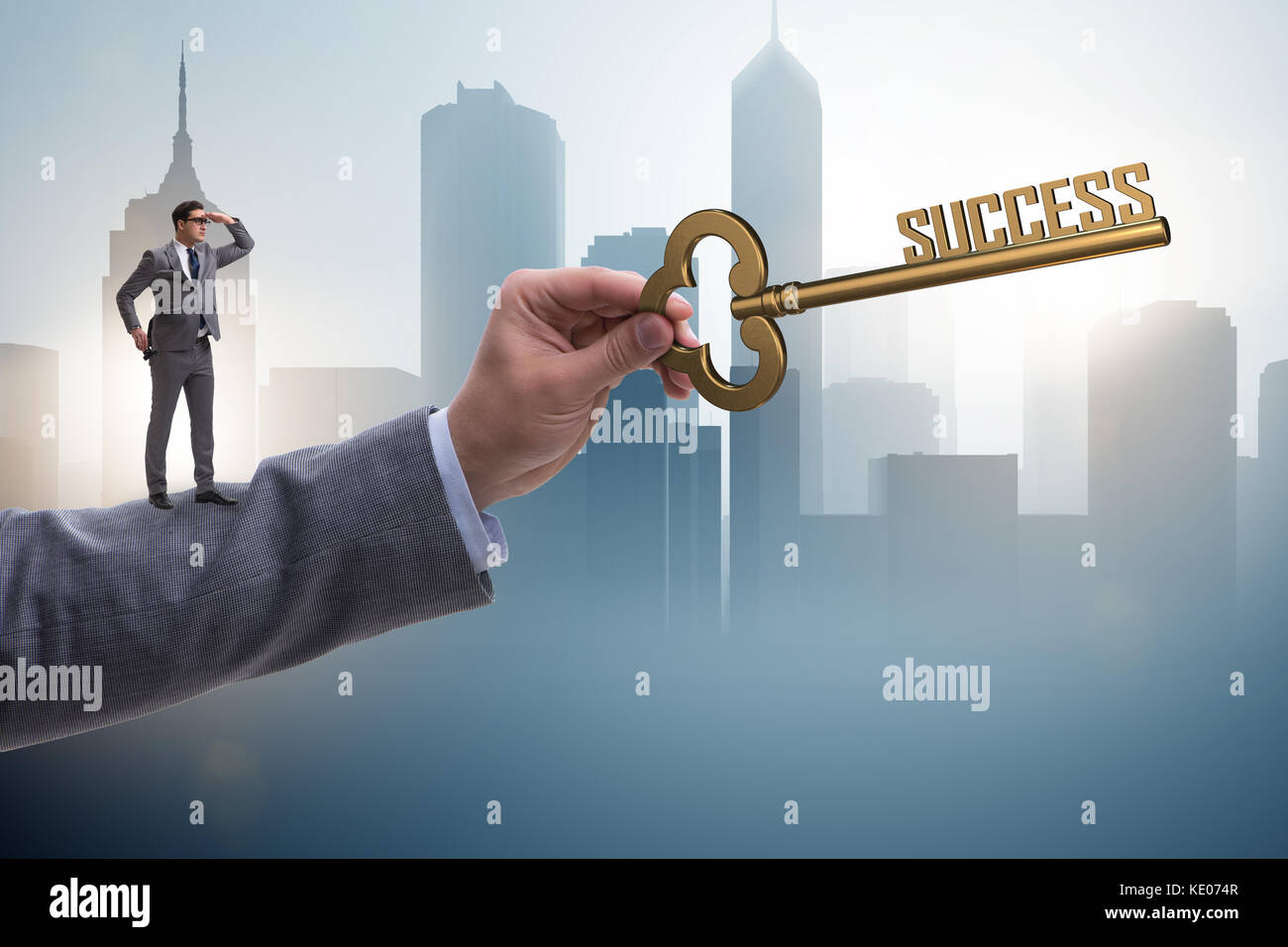 Businessman with key to success business concept Stock Photo - Alamy