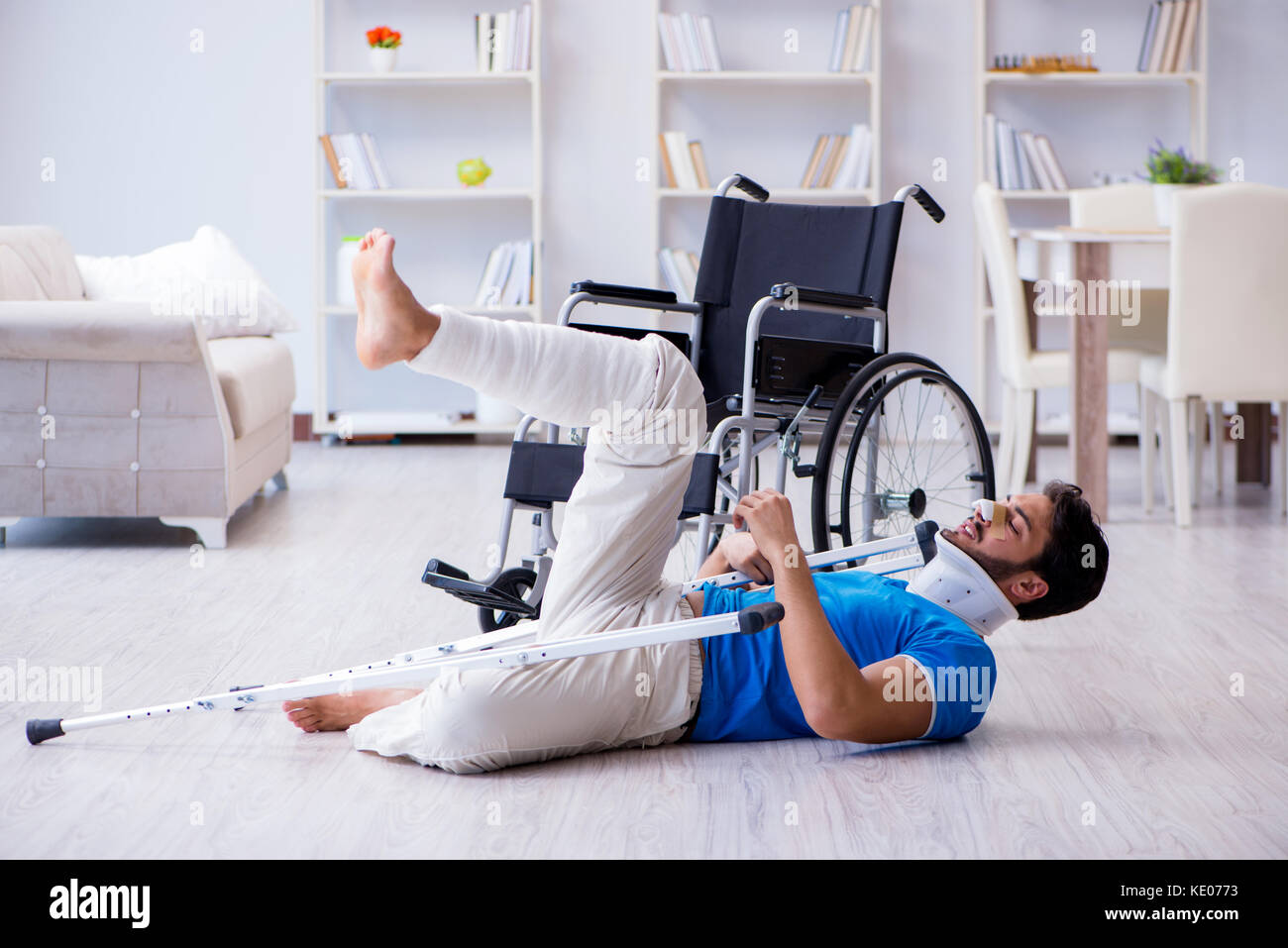 Injured young man recovering at home Stock Photo - Alamy