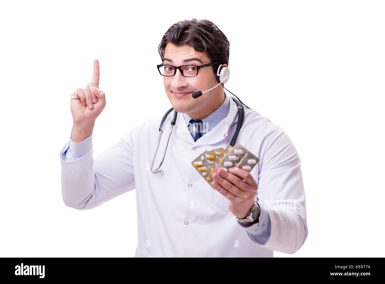 Young doctor with phone headset isolated on white Stock Photo - Alamy