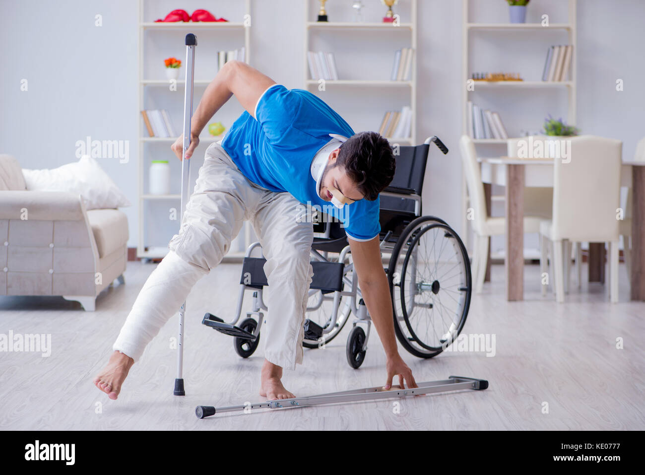 Injured young man recovering at home Stock Photo - Alamy