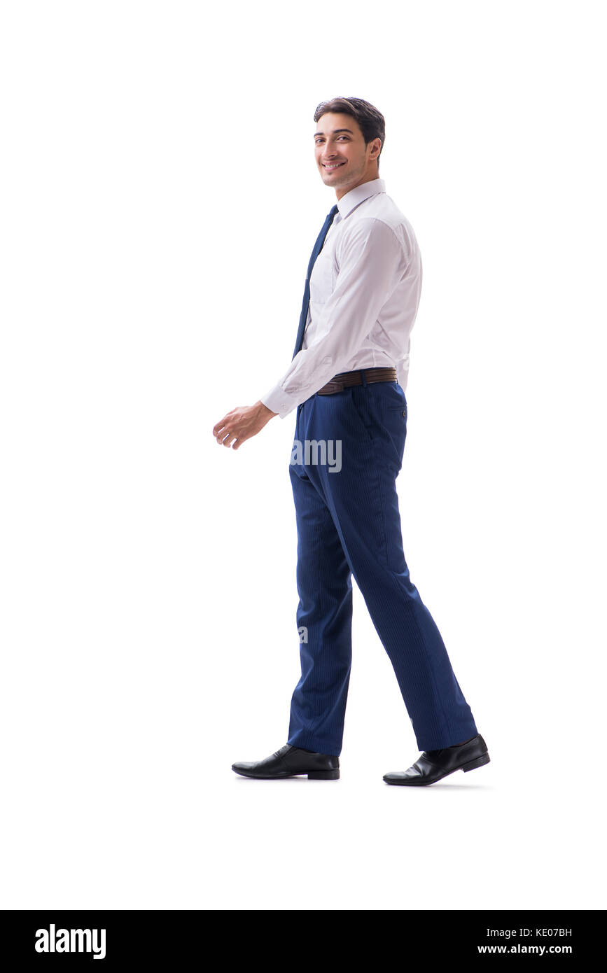 Businessman walking standing side view isolated on white background ...