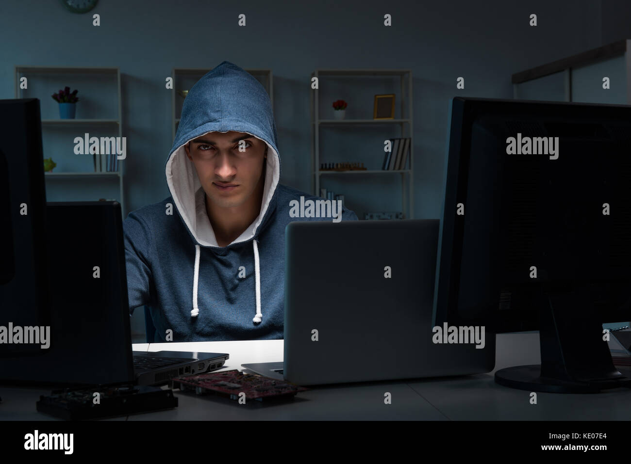 Hacker hacking computer at night Stock Photo - Alamy