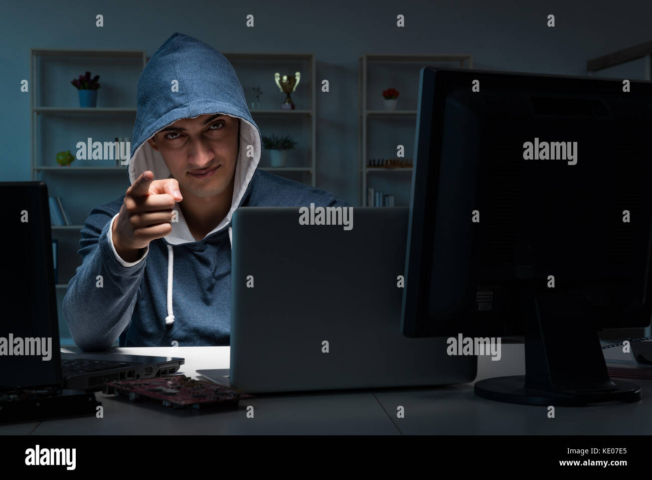 Hacker hacking computer at night Stock Photo - Alamy