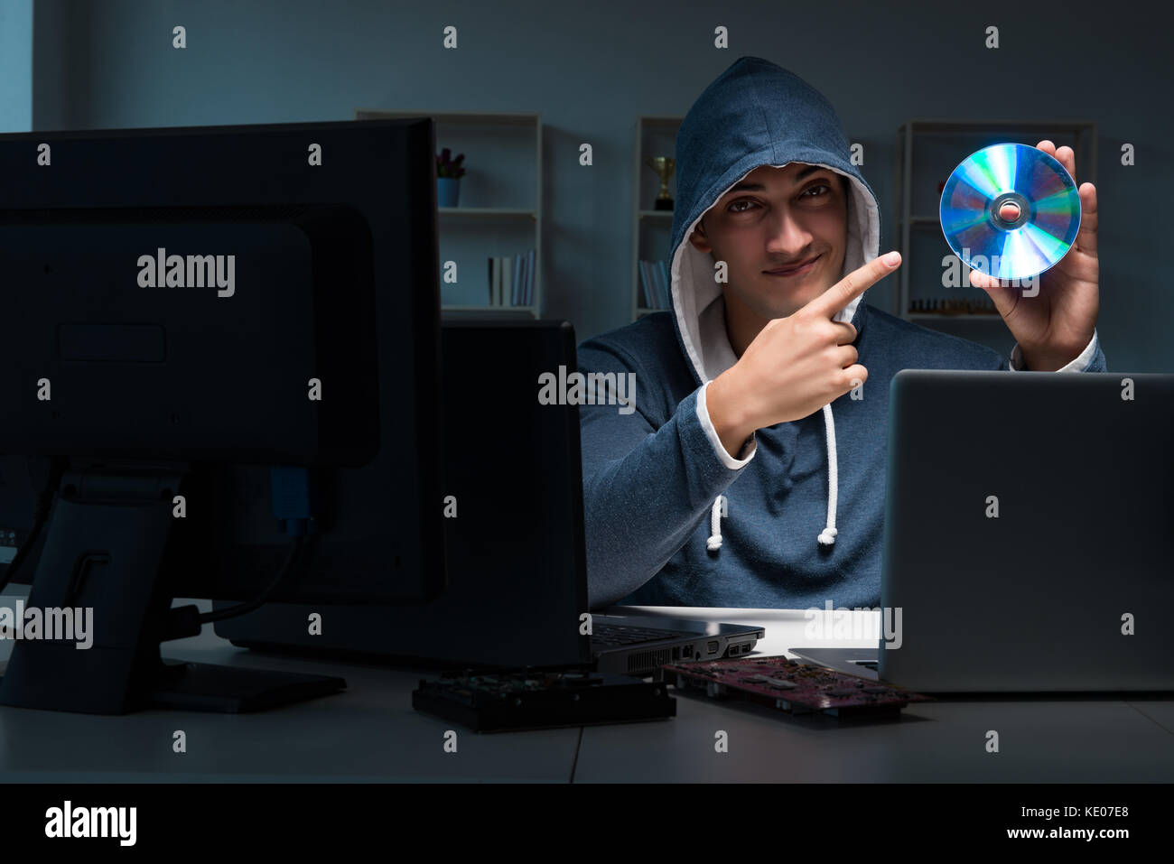 Hacker hacking computer at night Stock Photo - Alamy