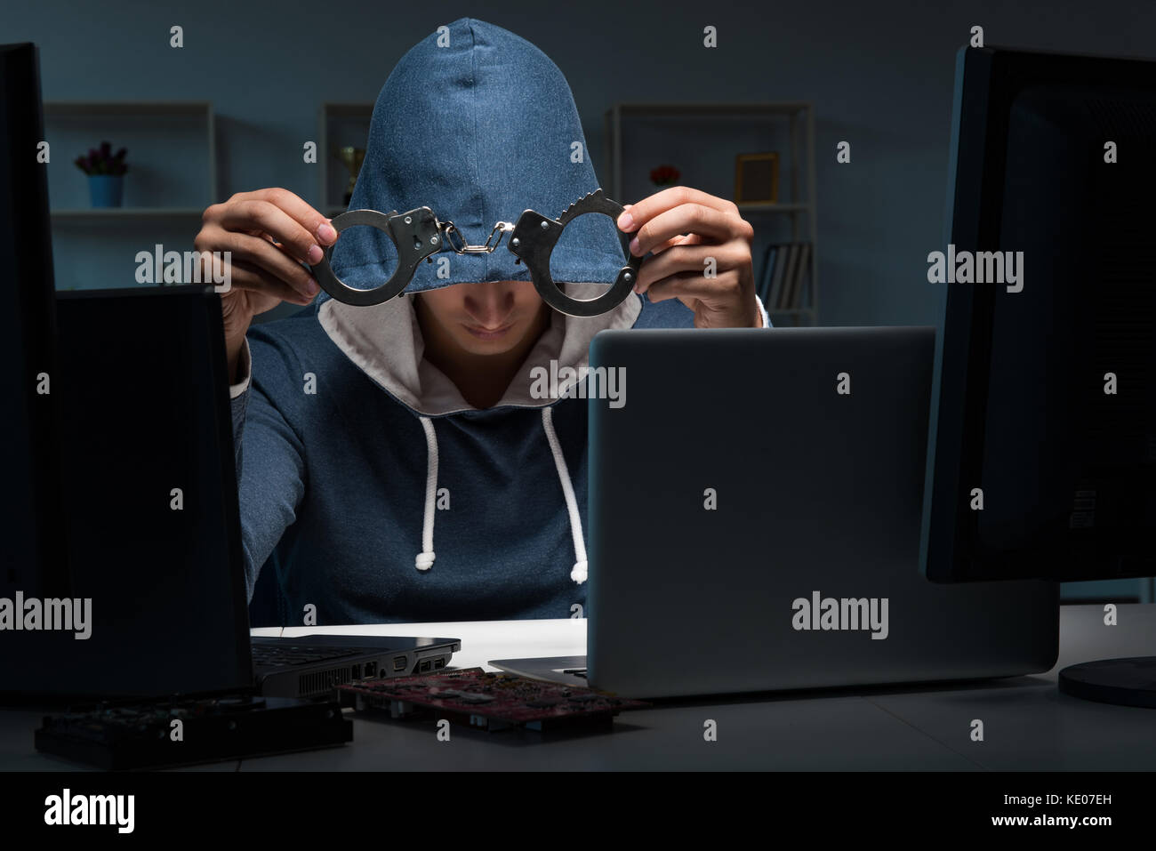 Hacker hacking computer at night Stock Photo - Alamy