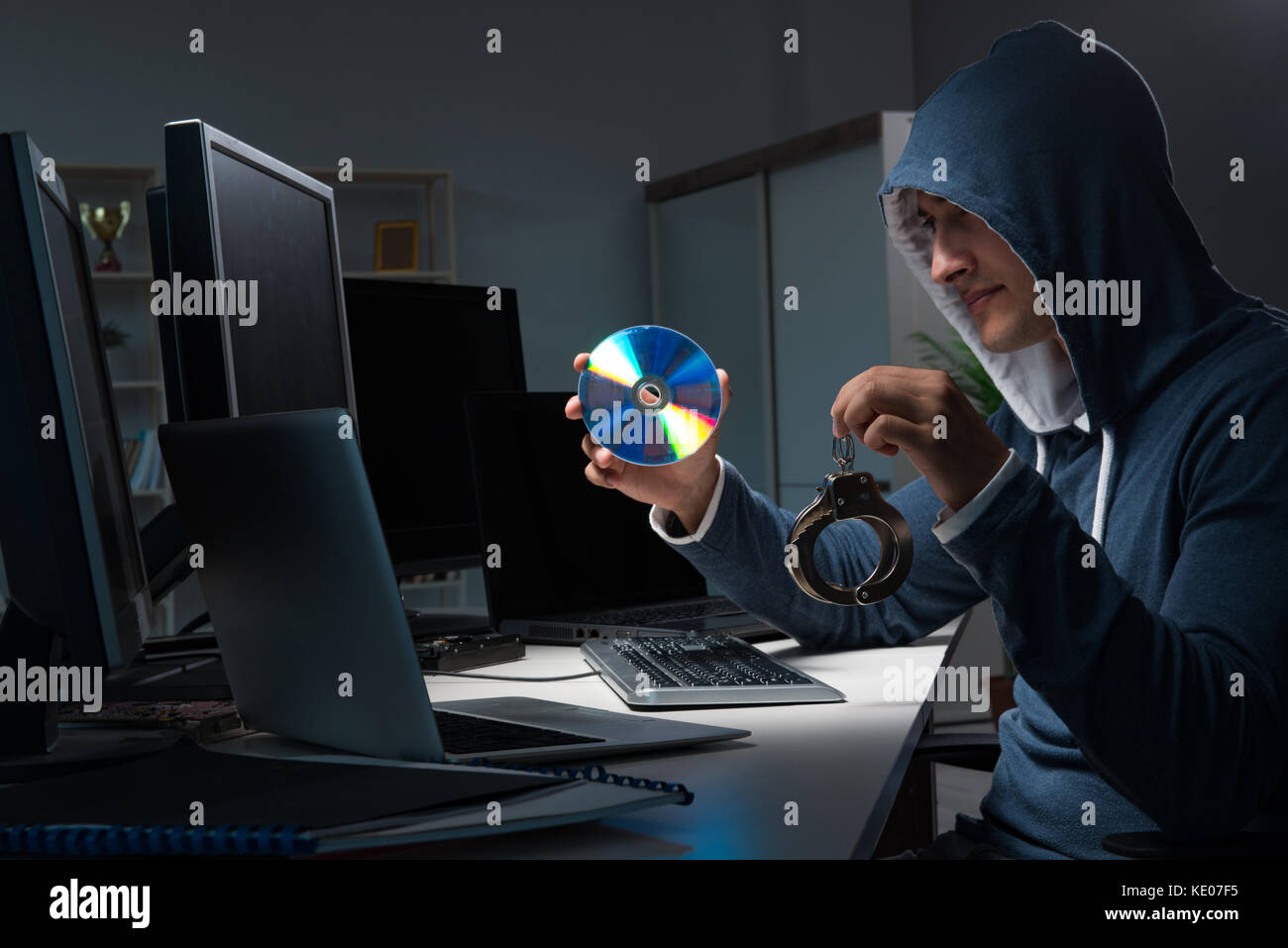 Hacker hacking computer at night Stock Photo - Alamy