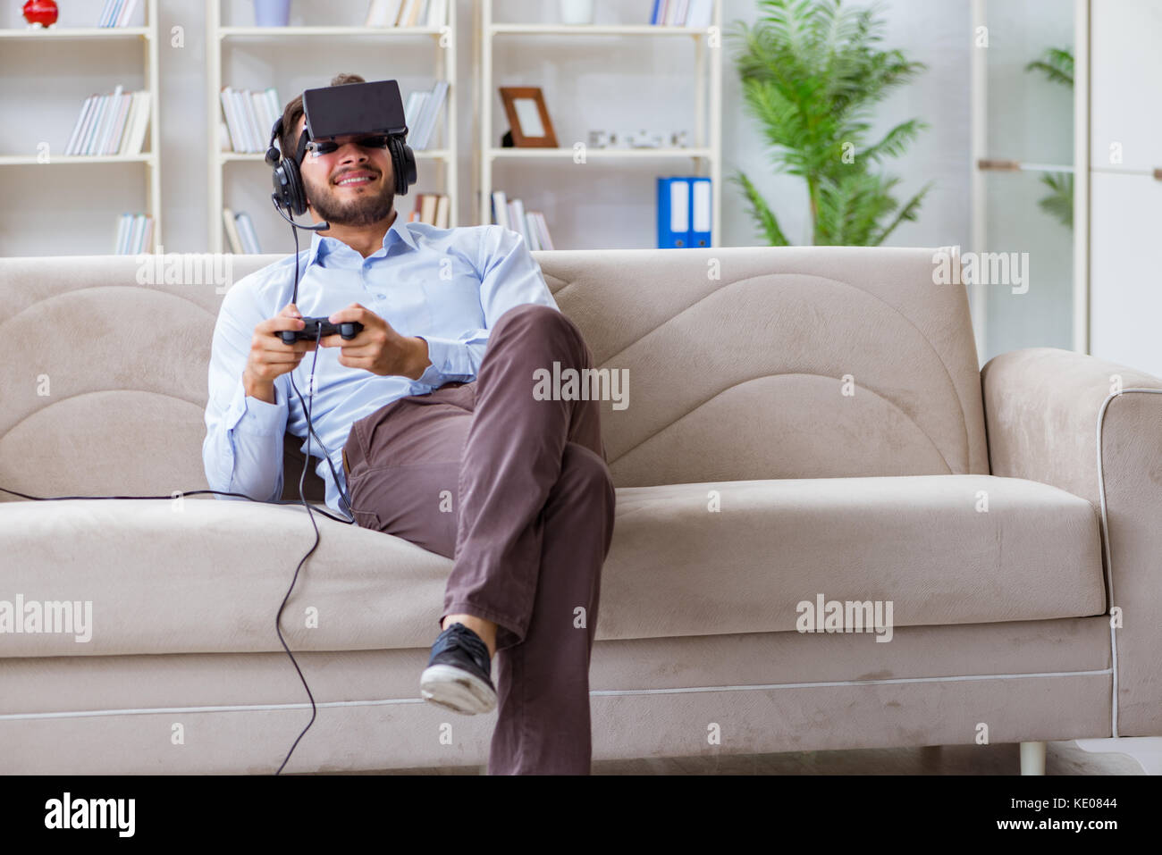 Student gamer playing games at home Stock Photo - Alamy
