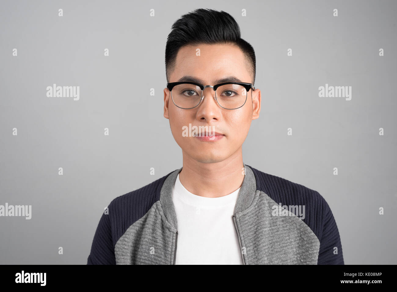 A portrait of asian man with serious emotion face Stock Photo - Alamy