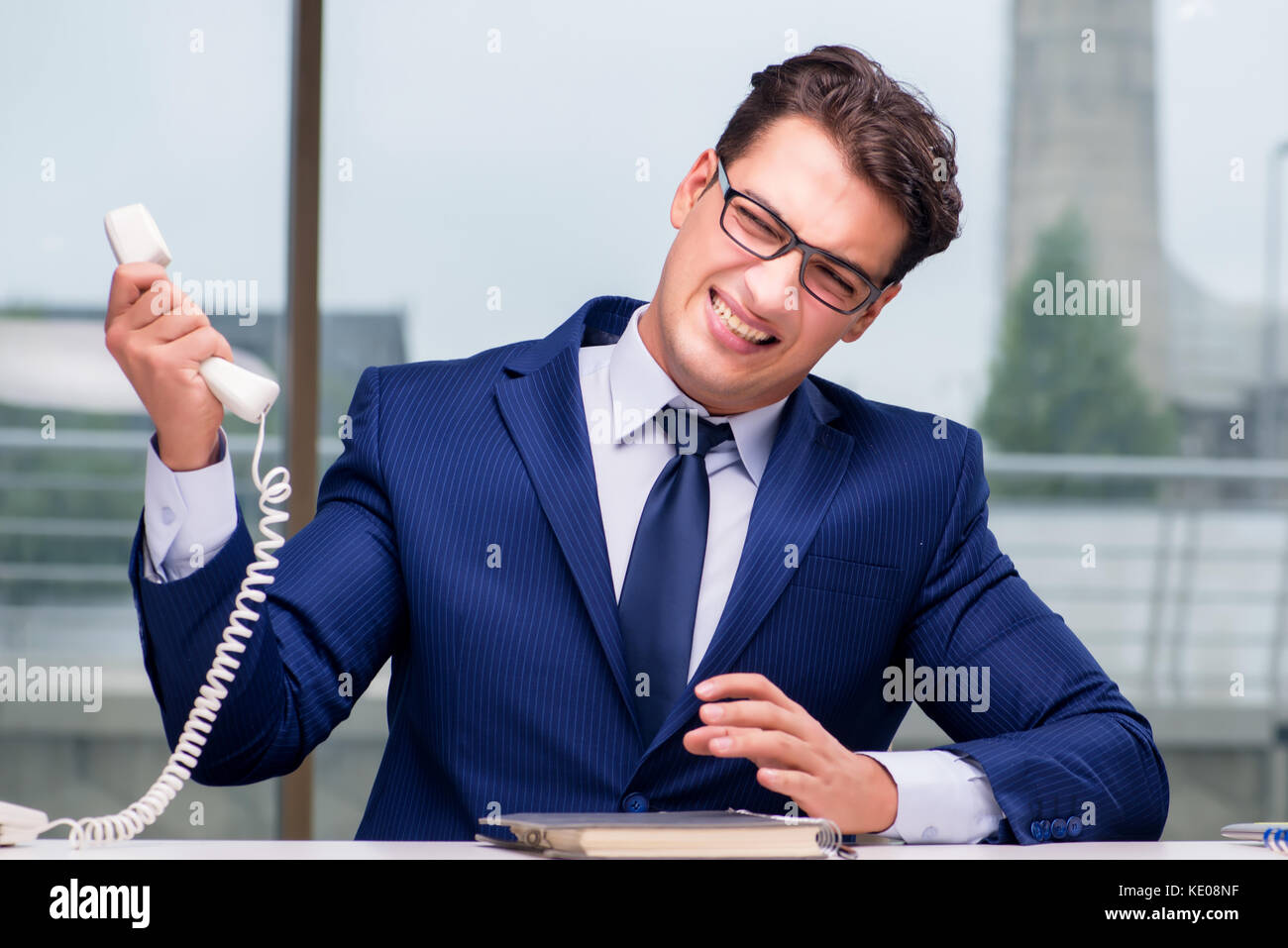 Angry call center employee yelling at customer Stock Photo - Alamy