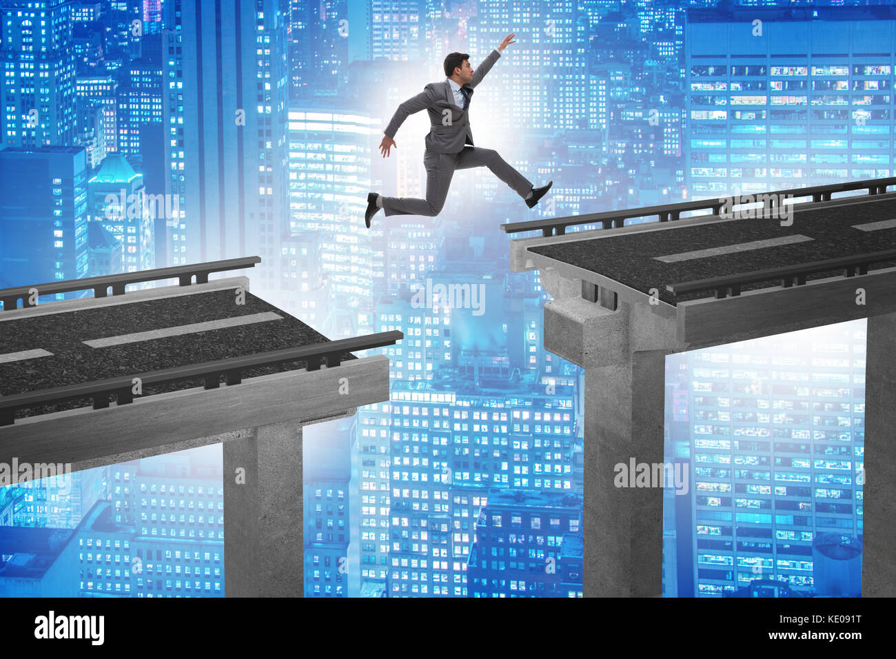 Young businessman jumping over the bridge Stock Photo - Alamy