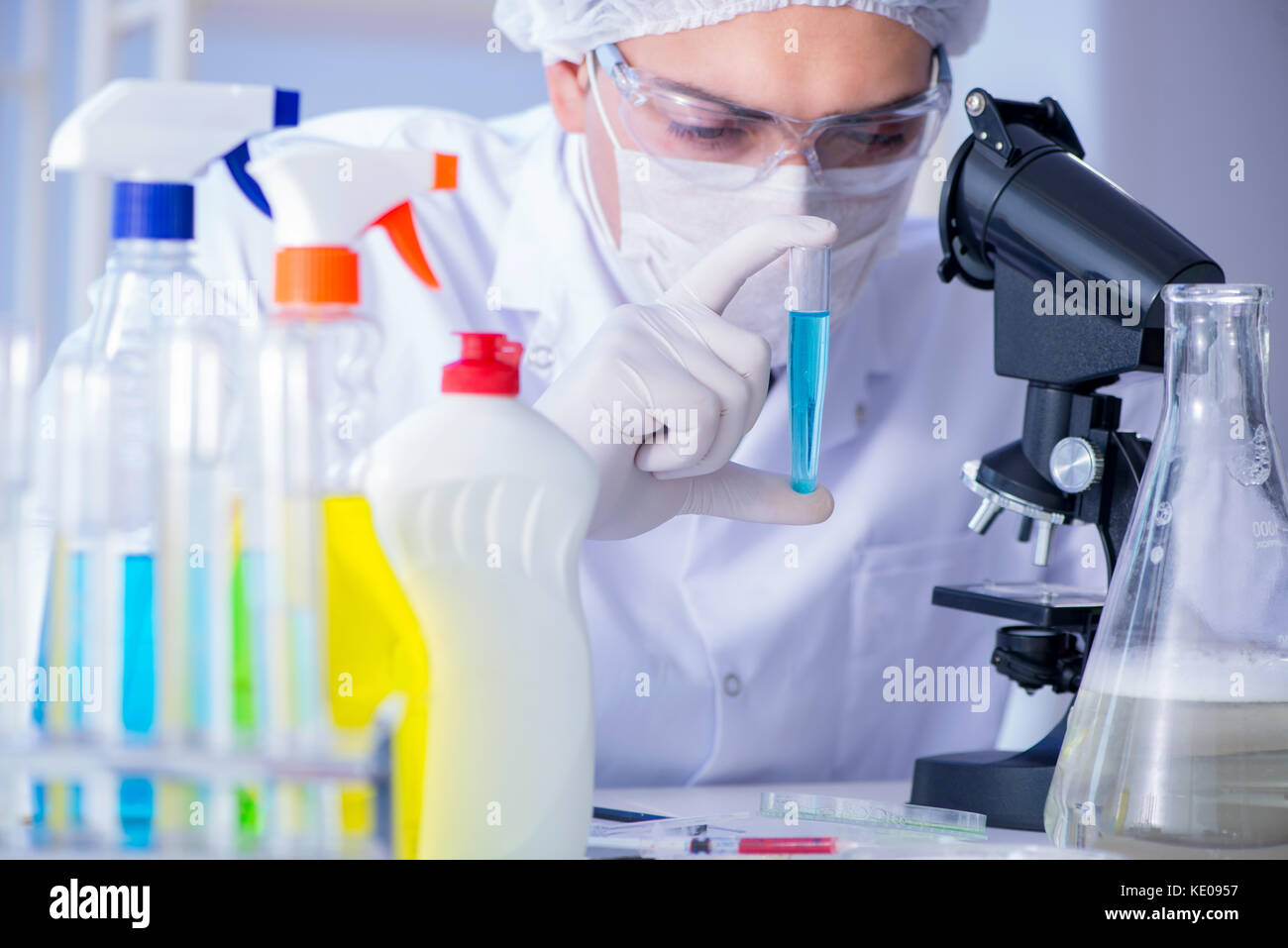 Man in the lab testing new cleaning solution detergent Stock Photo - Alamy