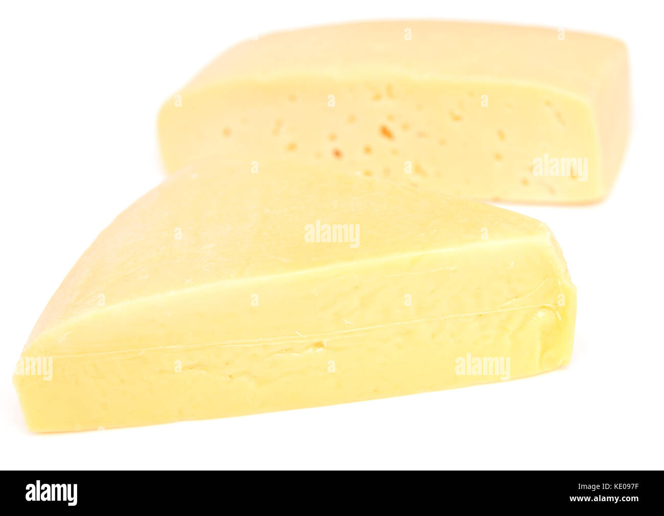 Pieces of cheddar cheese top view Cut Out Stock Images & Pictures - Alamy
