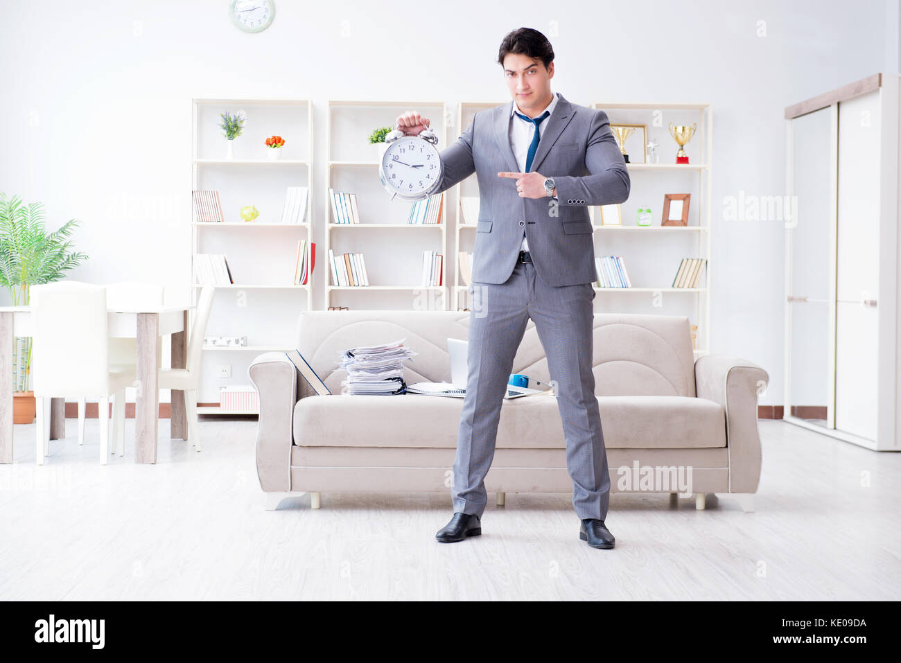 Businessman happy meeting his deadlines Stock Photo - Alamy