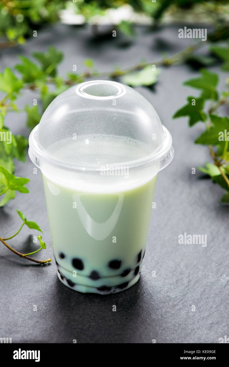 Bubble boba tea with milk and tapioca pearls in plastic cup Stock Photo ...