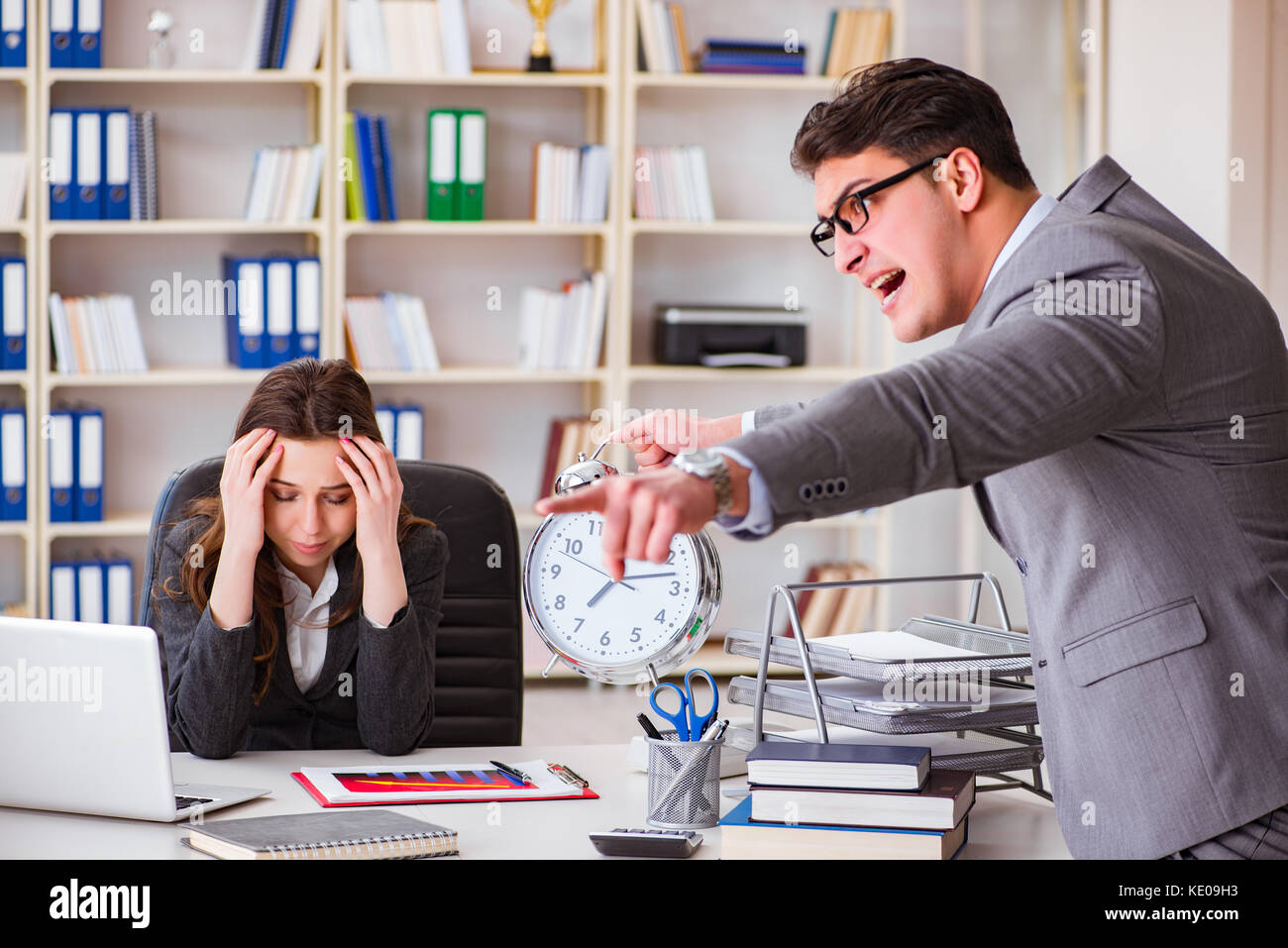 Office conflict between man and woman Stock Photo - Alamy