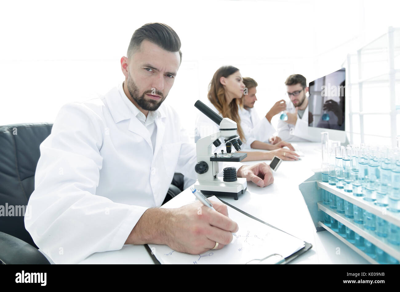 serious scientists working in the laboratory Stock Photo - Alamy