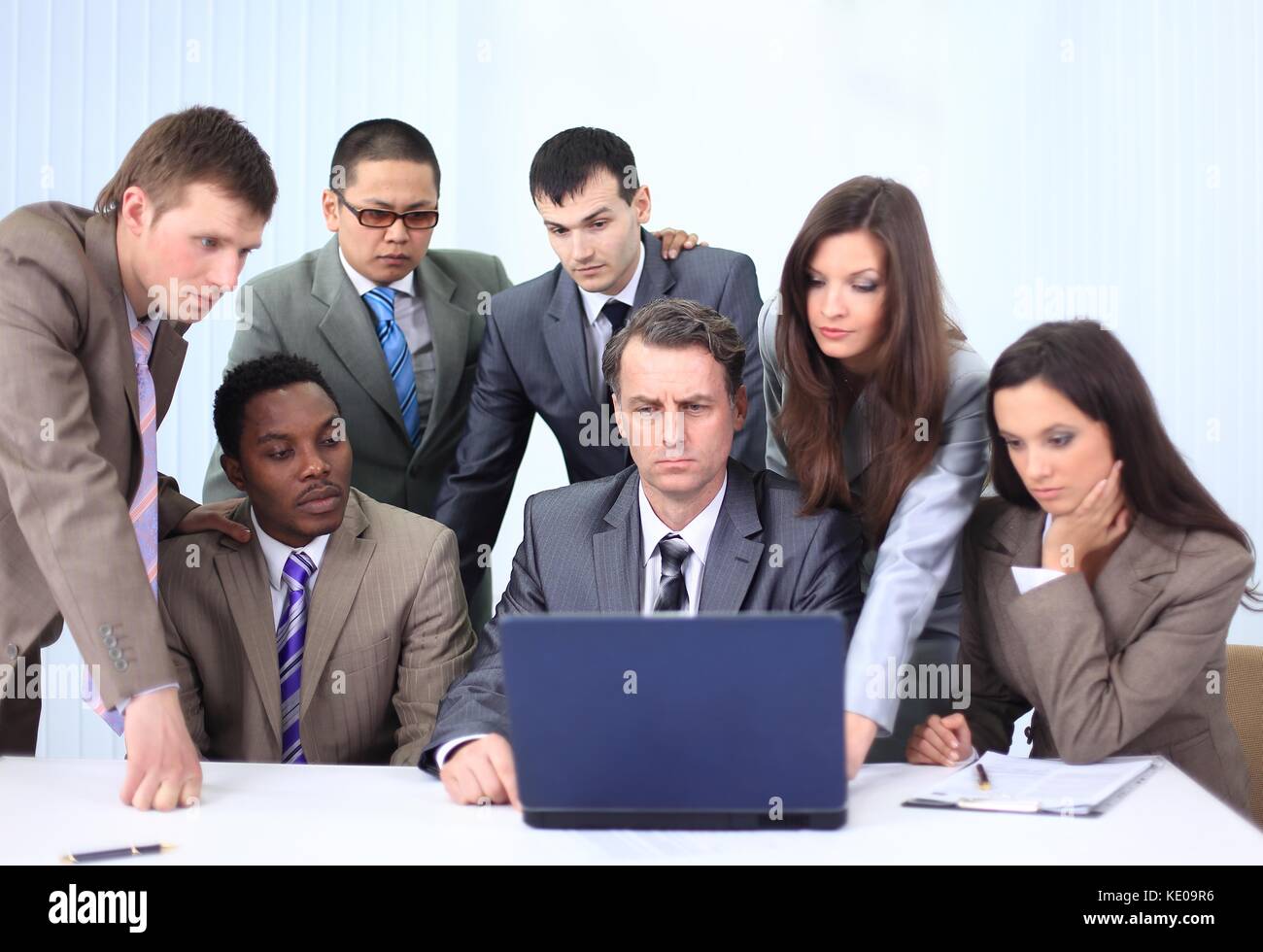 Manager and business team in office Stock Photo - Alamy