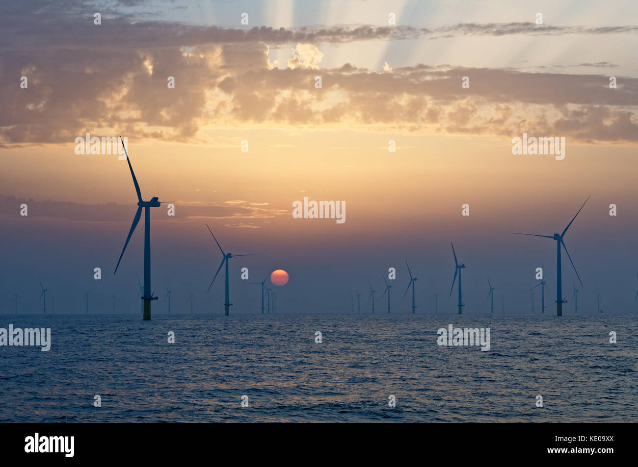 Sunset at the Rampion Offshore Windfarm, near Brighton, England Stock ...