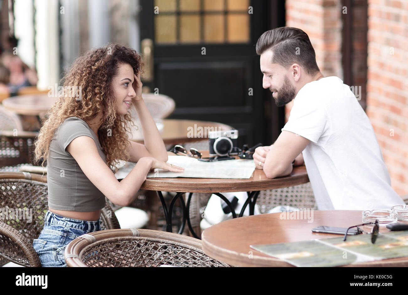 Beautiful loving couple sitting in a cafe enjoying in coffee Stock ...