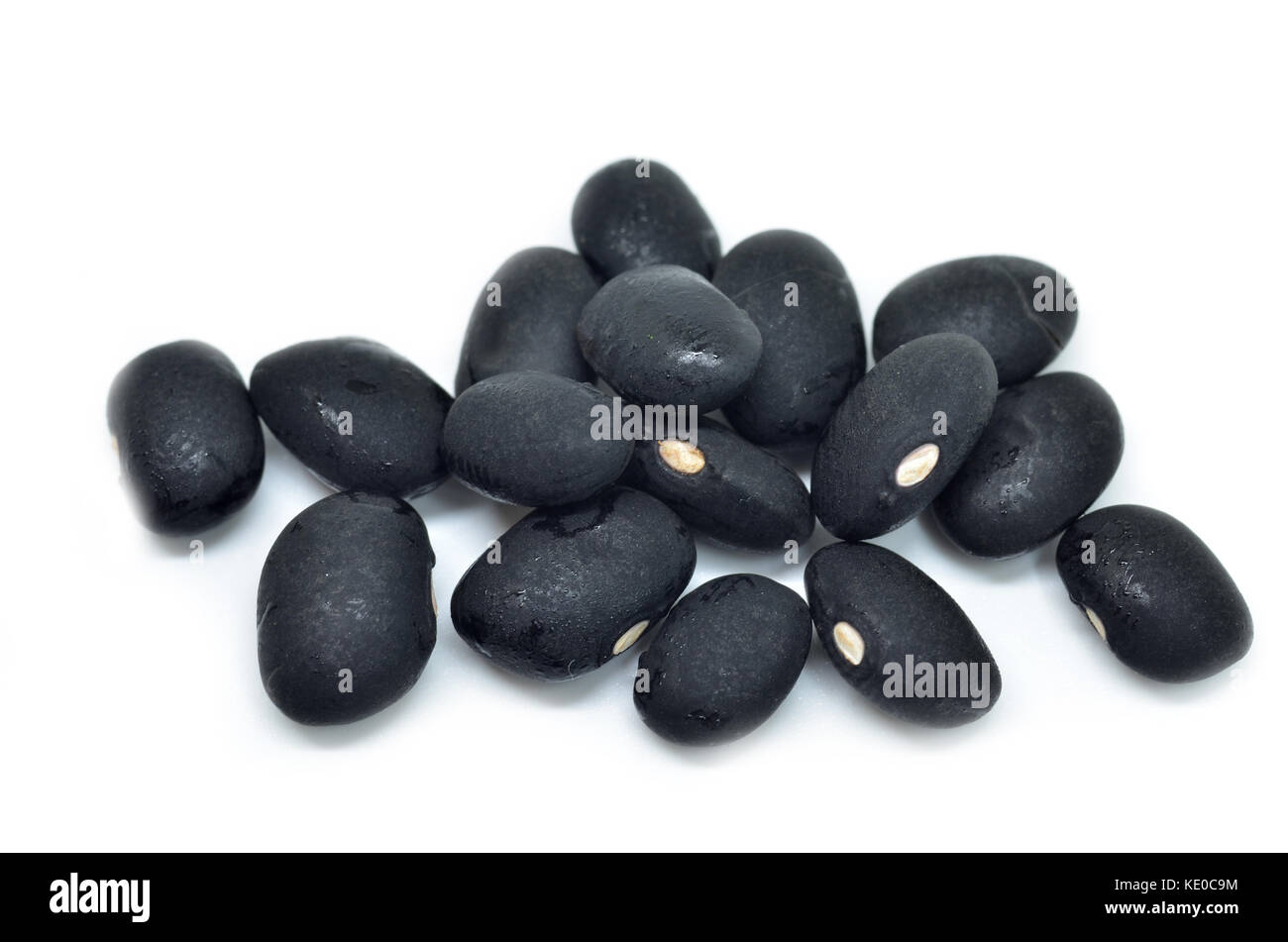 Small handful of black beans. Beans isolated on a white background ...