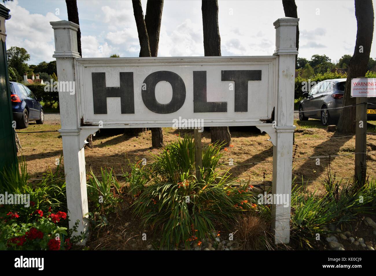 Holt railway station name sign on the poppy line Stock Photo - Alamy