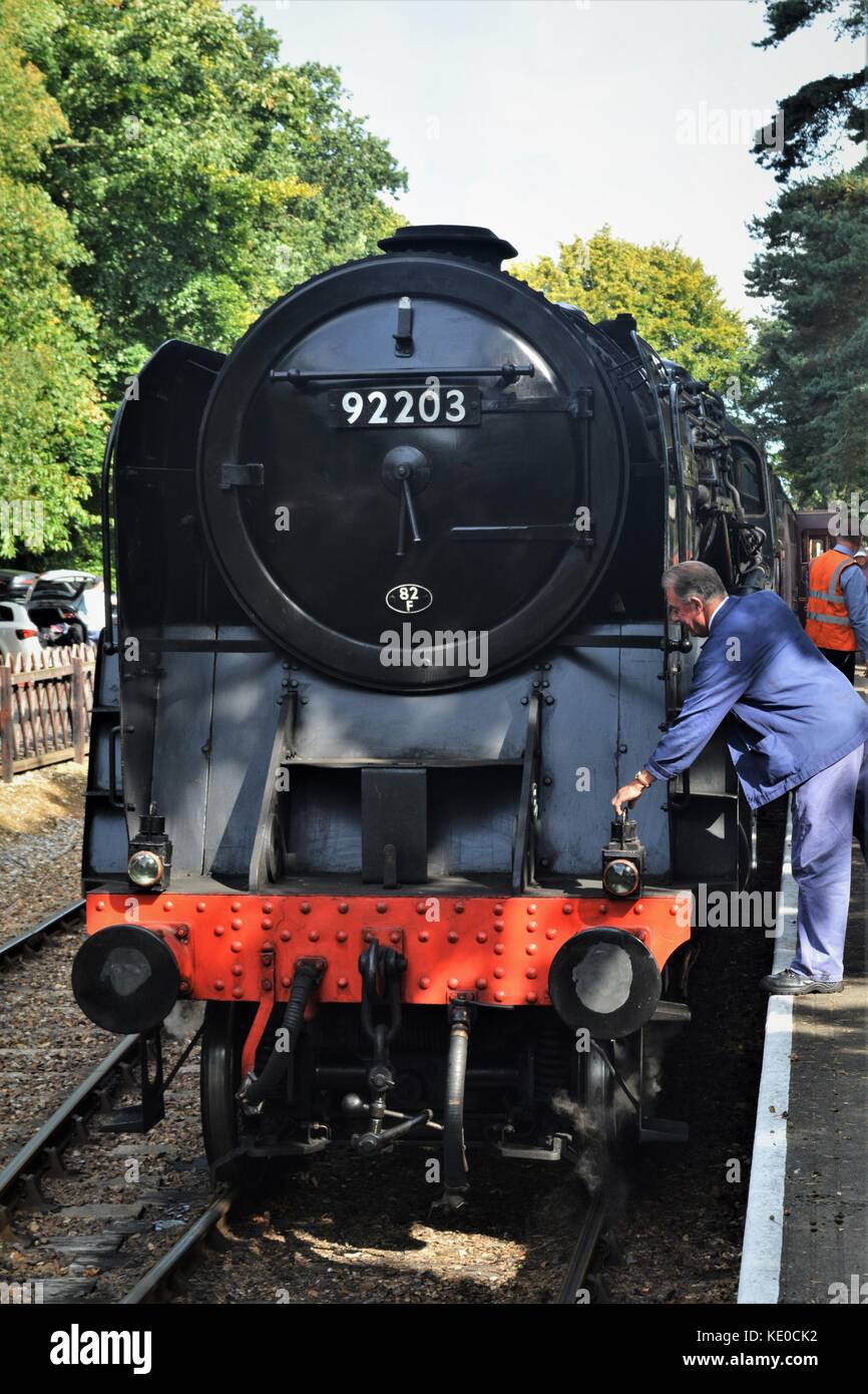 Classic steam engine at Holt station platform 92203 Black Prince Stock ...