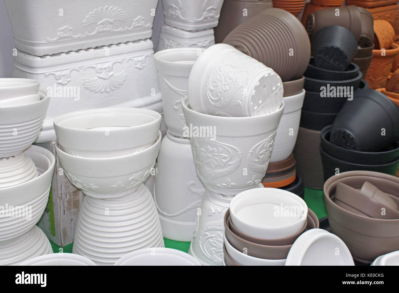 Big pile of empty decorative flower pots Stock Photo - Alamy