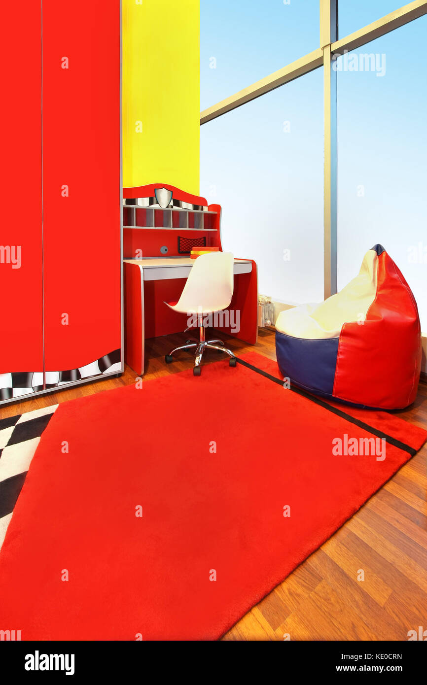 Modern children room interior with red furniture Stock Photo - Alamy