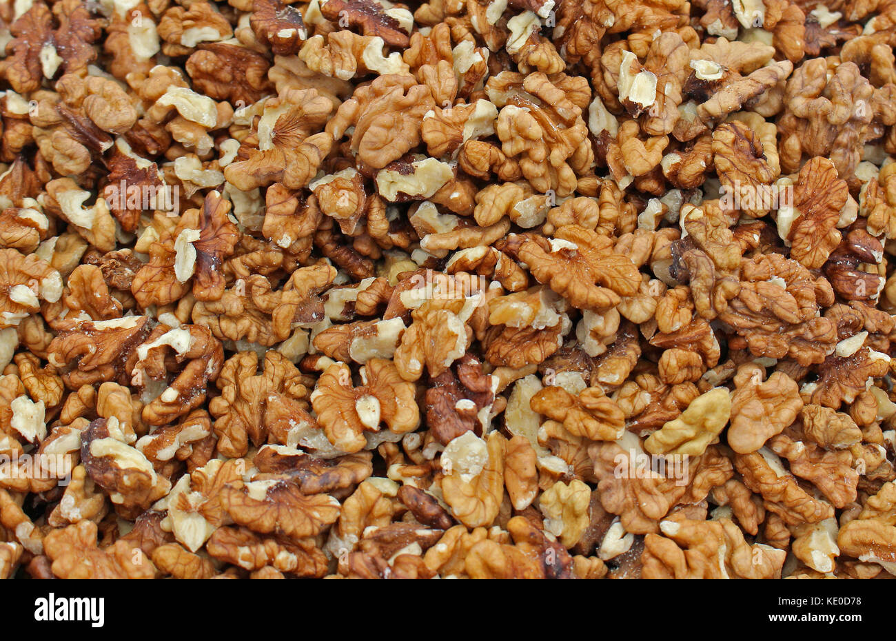 Big pile of raw walnuts out of shell Stock Photo - Alamy