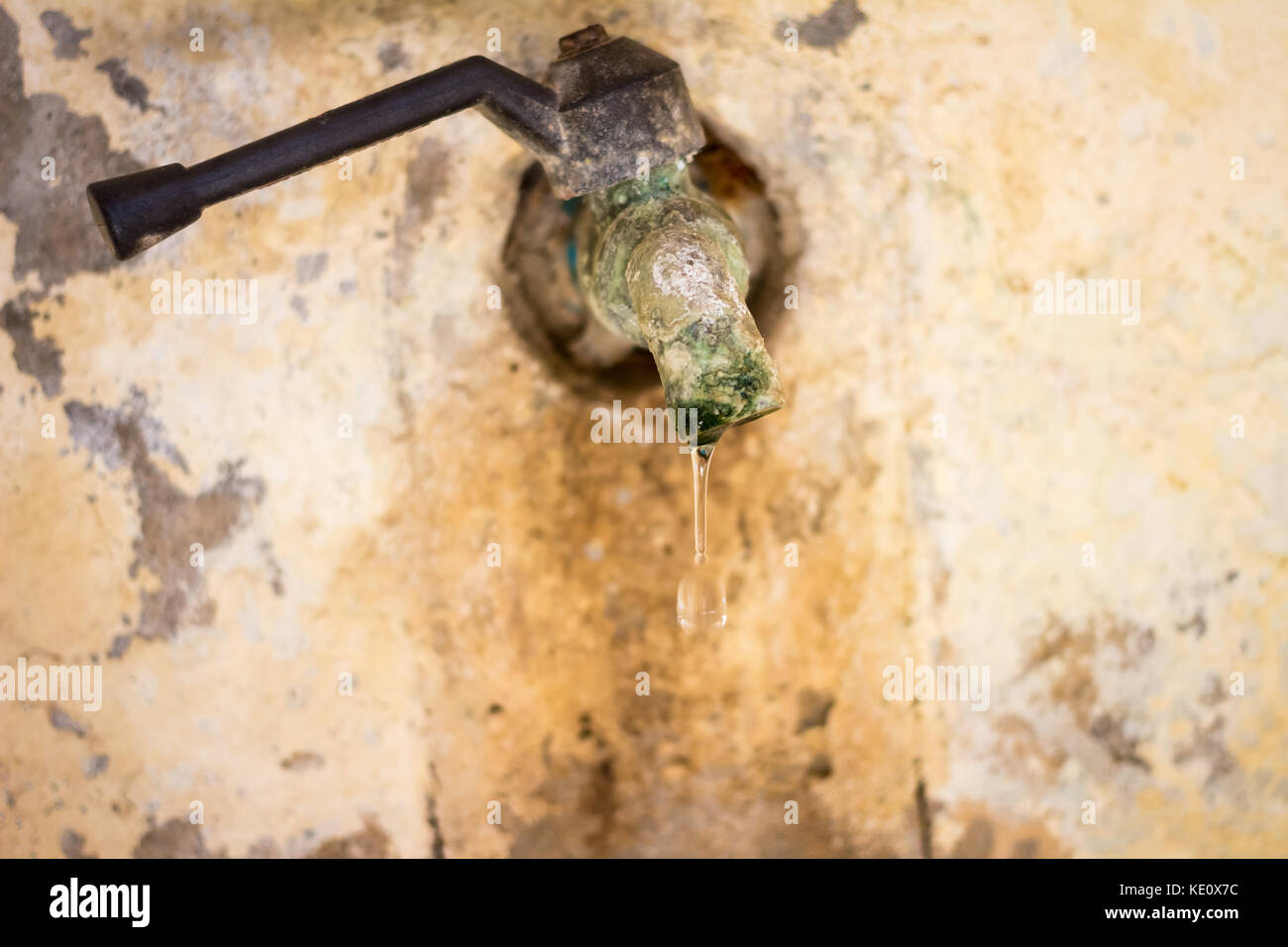 old rusty tap leaking water Stock Photo - Alamy