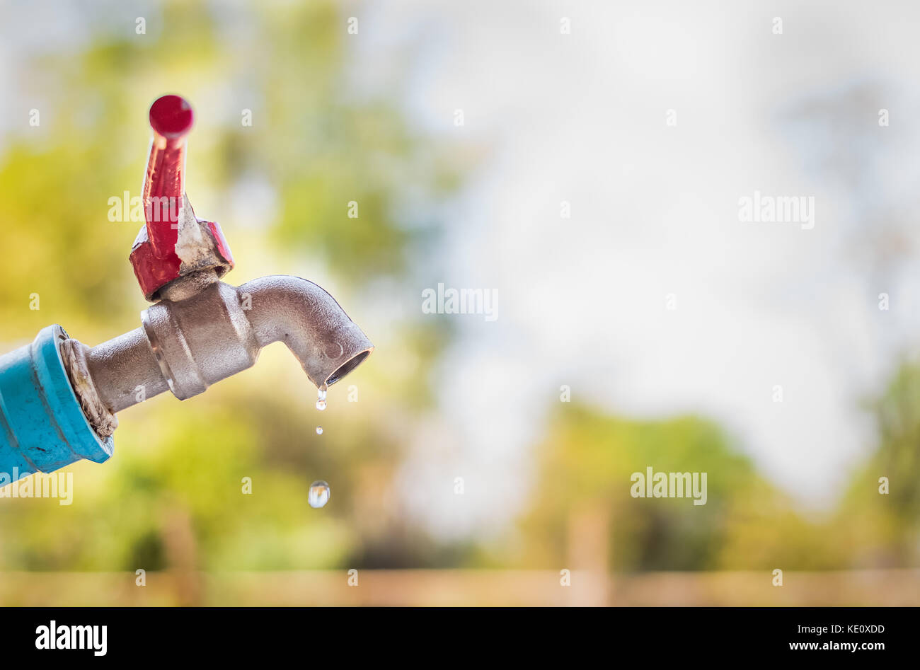 old rusty tap leaking water Stock Photo - Alamy