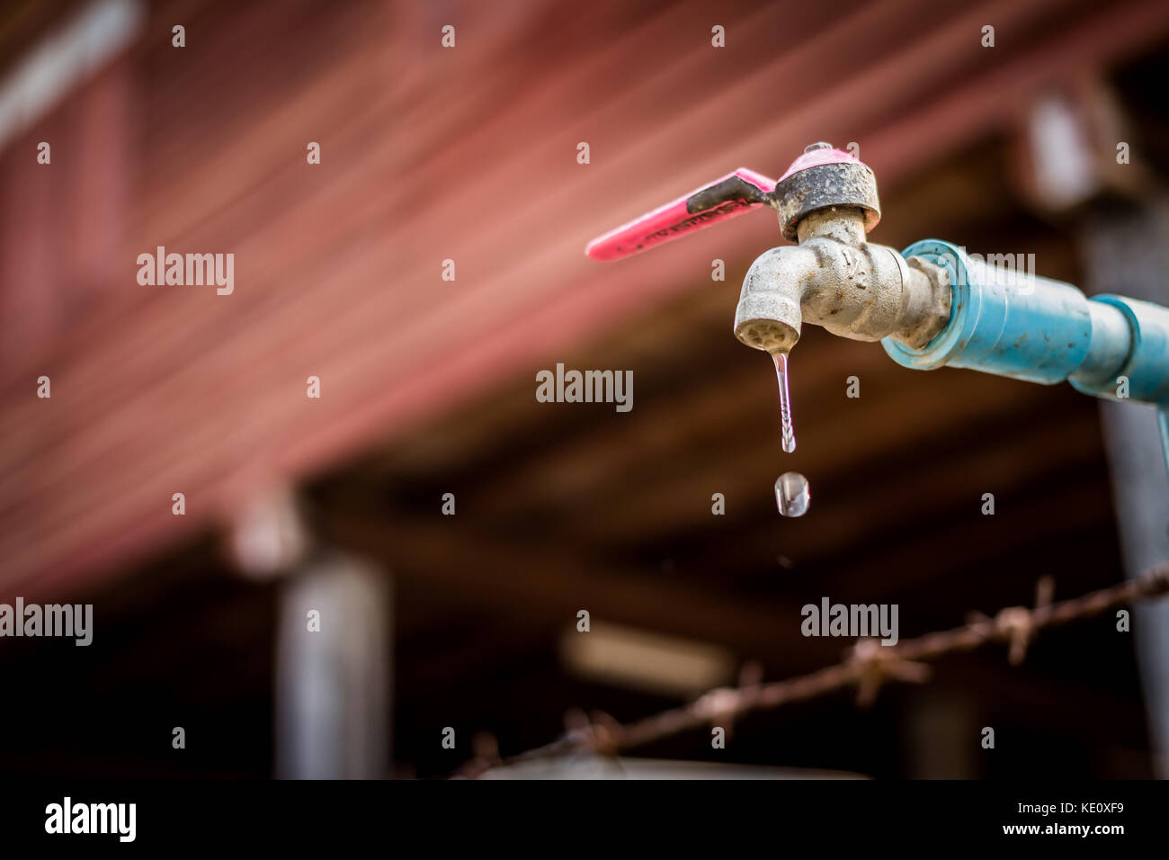 old rusty tap leaking water Stock Photo - Alamy