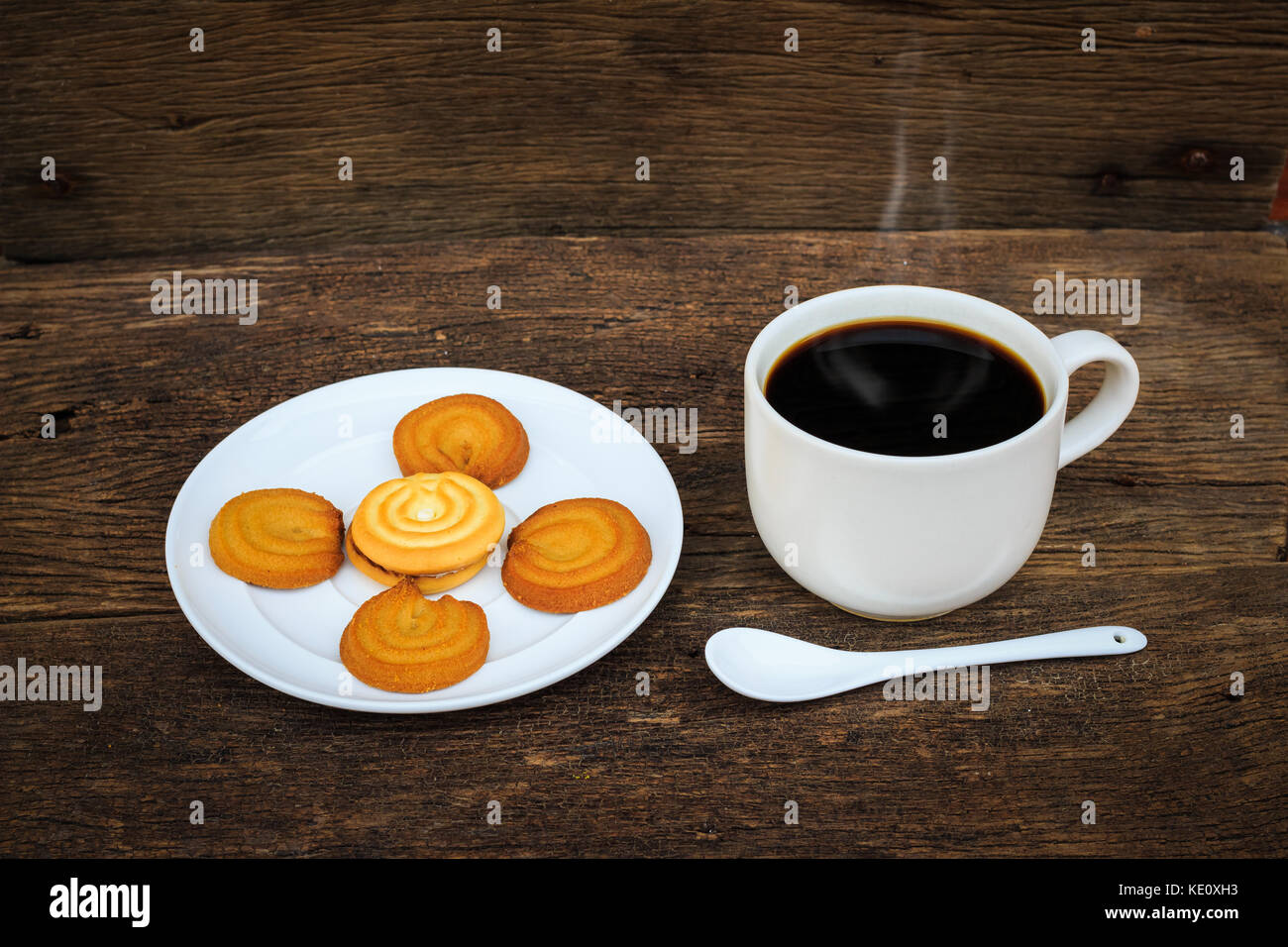 Cup of coffee on wooden table background Stock Photo - Alamy