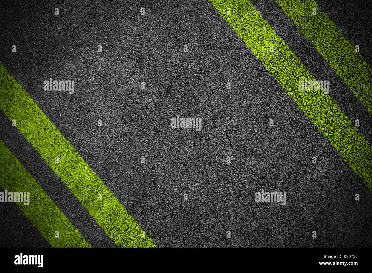 Road texture with four yellow Stock Photo - Alamy