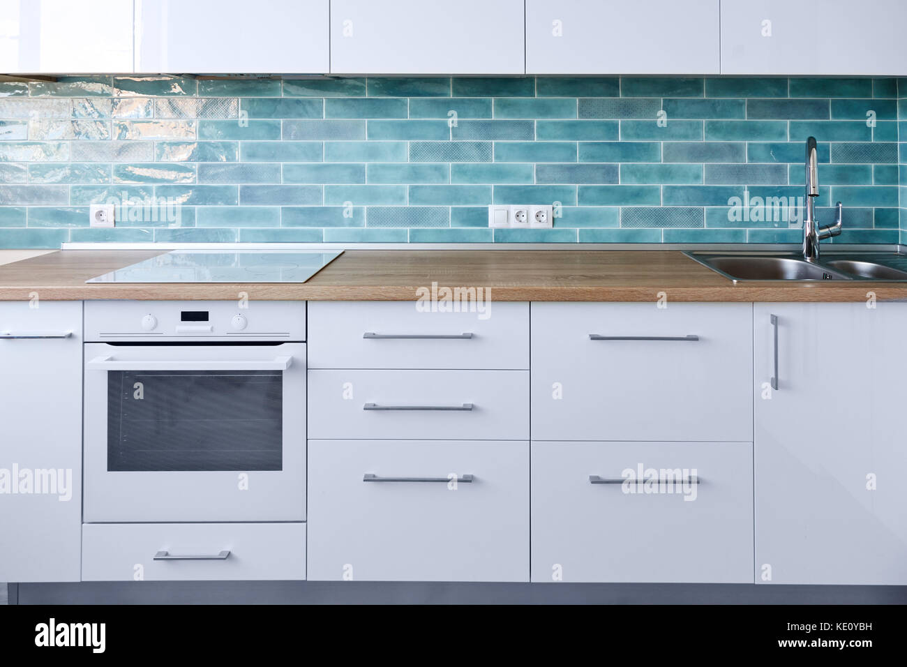 Modern white kitchen furniture Stock Photo - Alamy
