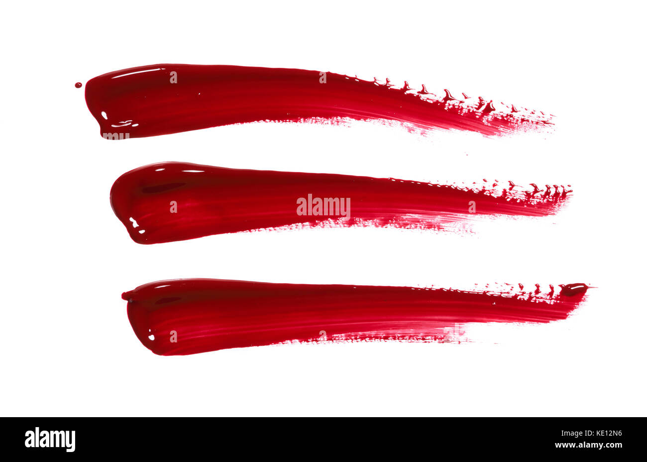cosmetic products smear paint of crushed cosmetic on a white background ...