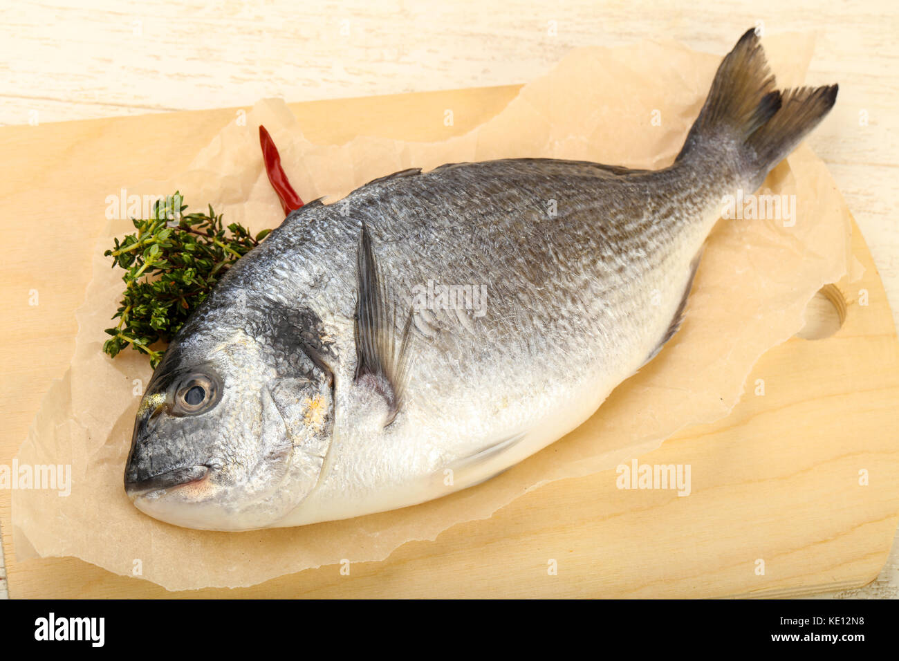 raw dorada fish - ready for cooking Stock Photo - Alamy